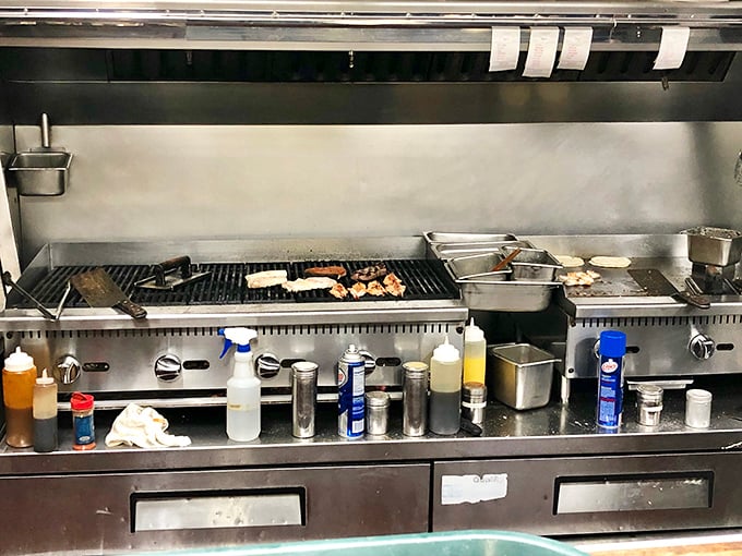 Behind the scenes, the grill sizzles with promise – the backstage area where seafood transforms from market-fresh to plate-perfect.