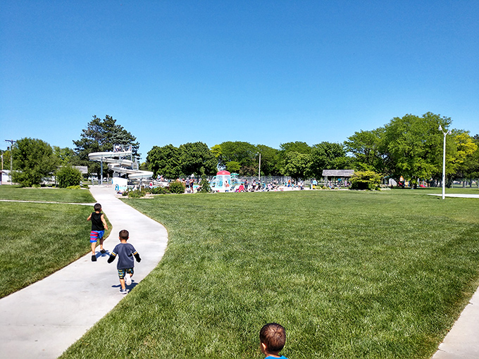 Children racing toward summer joy&mdash;the universal language of "last one in is a rotten egg!" Lexington's aquatic center delivers memories by the gallon.