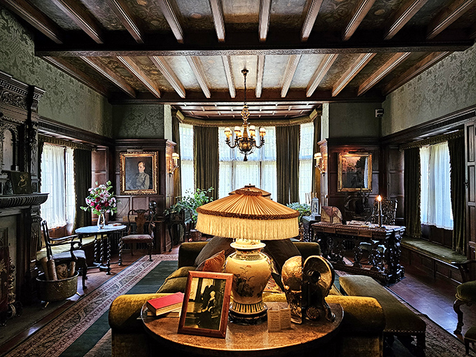 The manor's living room exudes old-world charm with its wood paneling and vintage furnishings&mdash;like a museum where you're not allowed to touch anything, but desperately want to.