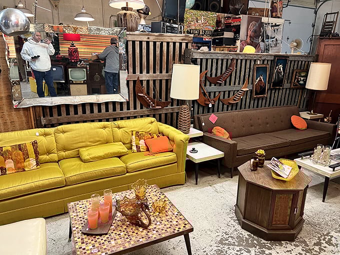 The living room section could furnish the perfect 1960s sitcom set&mdash;complete with wood paneling and enough seating for the whole Brady Bunch.