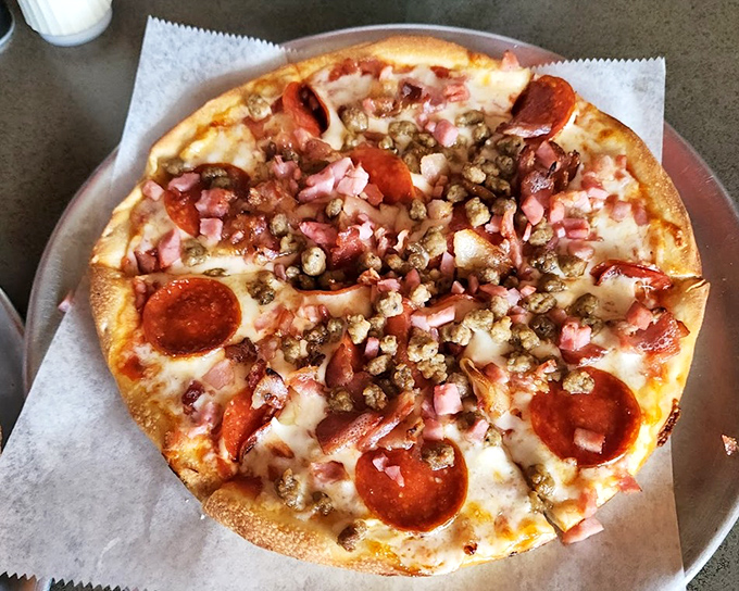 The meat lover's pizza doesn't just have toppings &ndash; it has a carnivorous congregation celebrating atop a perfect crust.