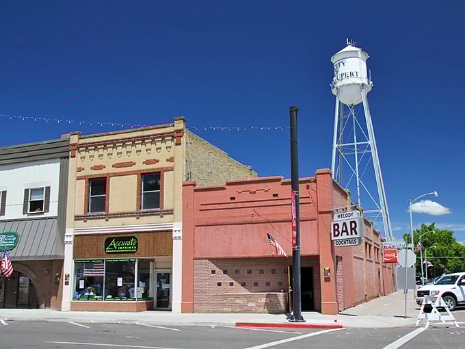 The Melody Bar's unassuming exterior hides a treasure trove of stories. Where else can you get a cold one without taking out a small loan?