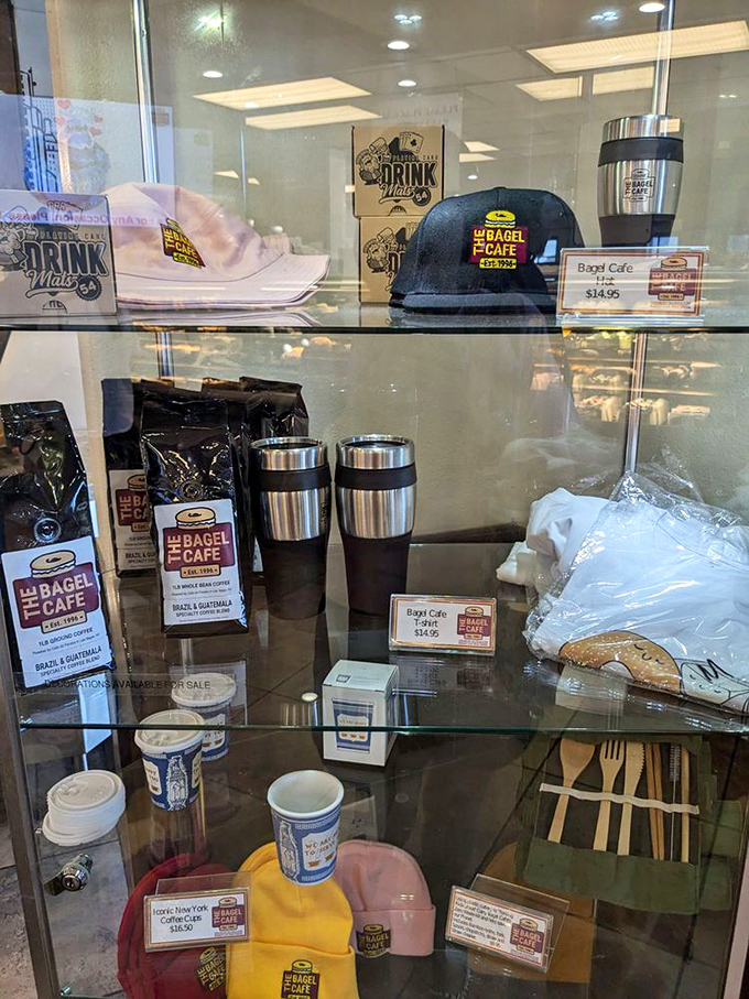 The merchandise display offers branded souvenirs&mdash;because sometimes you need a coffee mug to remember that life-changing pastrami.