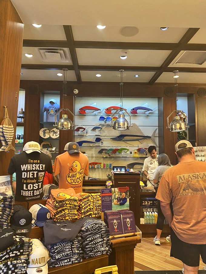 Even the merchandise corner embraces the nautical humor &ndash; because nothing says "I survived vacation" like a t-shirt declaring your whiskey diet.