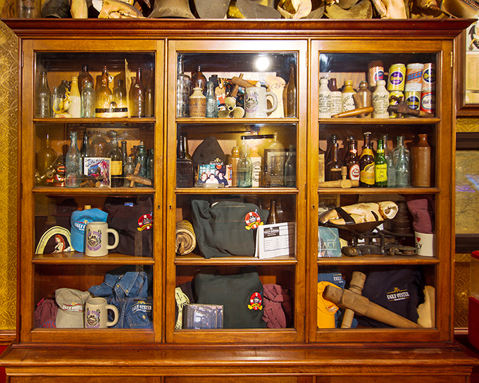 Display cases filled with steins and memorabilia tell stories of tradition, turning walls into museums of pub culture history.
