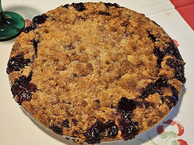 Mixed berry pie with that crumbly streusel topping represents everything wonderful about homestyle baking done with actual care.