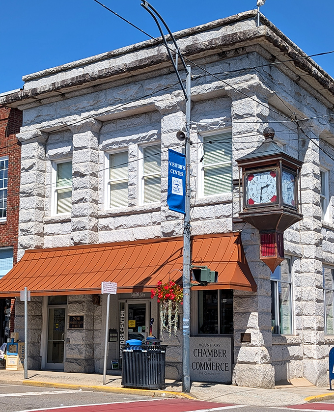 The Visitor Center's stately stone facade and vintage clock stand as downtown sentinels, welcoming travelers to a place where time moves at a more civilized pace.