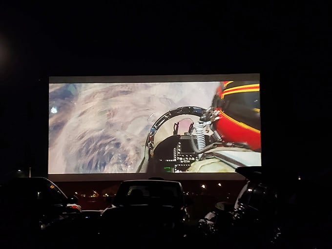 When the screen finally illuminates, it transforms a field of cars into a community of dreamers. For two hours, we all share the same adventure.