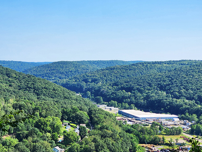 Rolling hills of endless green create a verdant tapestry surrounding Oil City, showcasing Pennsylvania's natural beauty in every direction.
