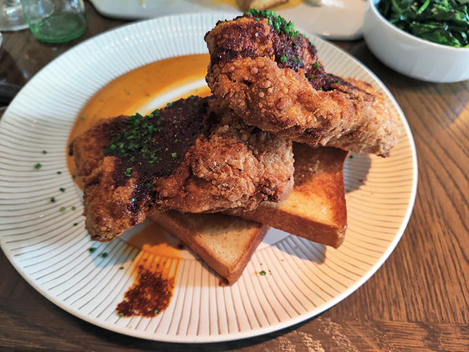 Fried chicken so perfectly golden-brown, it makes you want to write poetry about crispy skin and tender meat.