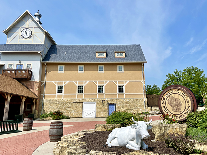 New Glarus Brewing Company's impressive facility features a white cow statue that seems to say, "Yes, this is where the famous Spotted Cow beer comes from."