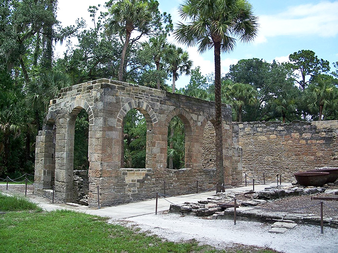 Ancient coquina stone arches of the Sugar Mill Ruins whisper stories from the 1800s. Florida's history stands defiantly against time and hurricane seasons. 