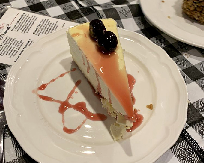 Cheesecake that makes you question why you ever considered saving room for dessert. That berry sauce is writing love letters to your taste buds.