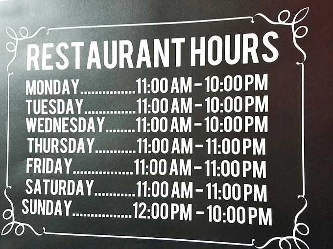Hours posted with the confidence of a place that knows exactly when you'll need your pizza fix &ndash; which is pretty much always.