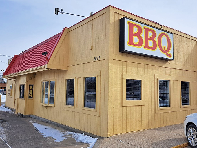 From this angle, the humble yellow building doesn't reveal the flavor explosions happening inside – like a delicious secret hiding in plain sight.
