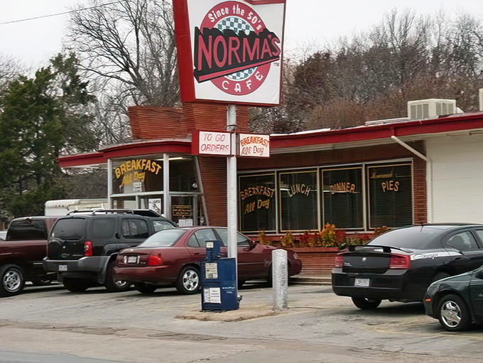 Even on a gray winter day, Norma's brick exterior and vintage sign stand as a colorful promise that comfort awaits just beyond those doors.