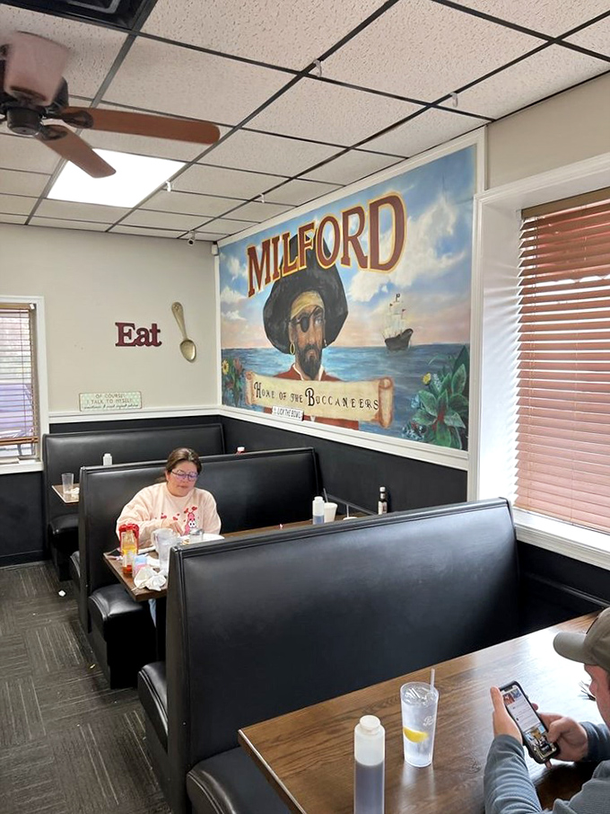 More pirate-themed decor watches over diners &ndash; because nothing says "hearty breakfast" quite like the watchful eye of a buccaneer.