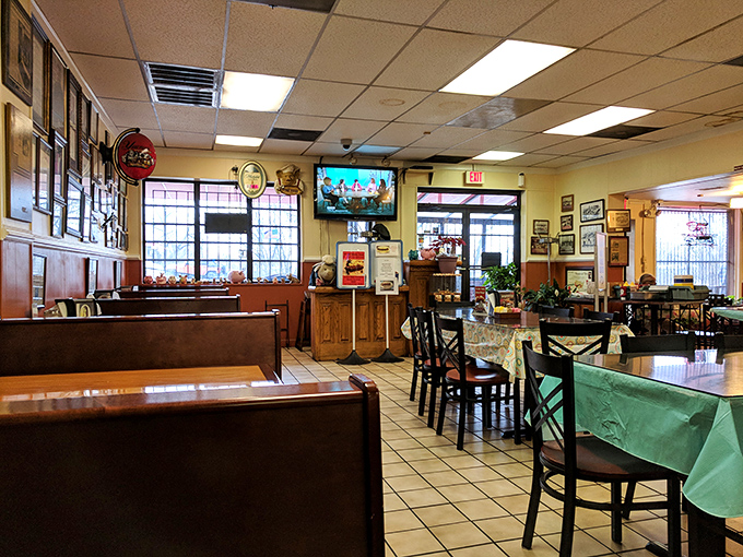 Simple tables, classic booths, and walls of fame&mdash;Interstate's interior design philosophy is "let the food do the talking."