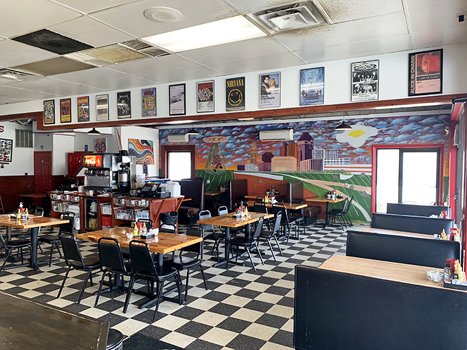The Columbus skyline mural watches over diners like a painted guardian angel of breakfast, adding local flair to classic comfort.