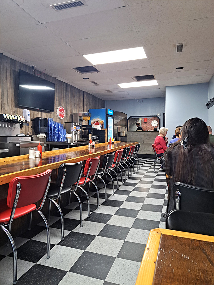 The counter seating isn't just functional&mdash;it's where solo diners become regulars and servers remember how you take your coffee.