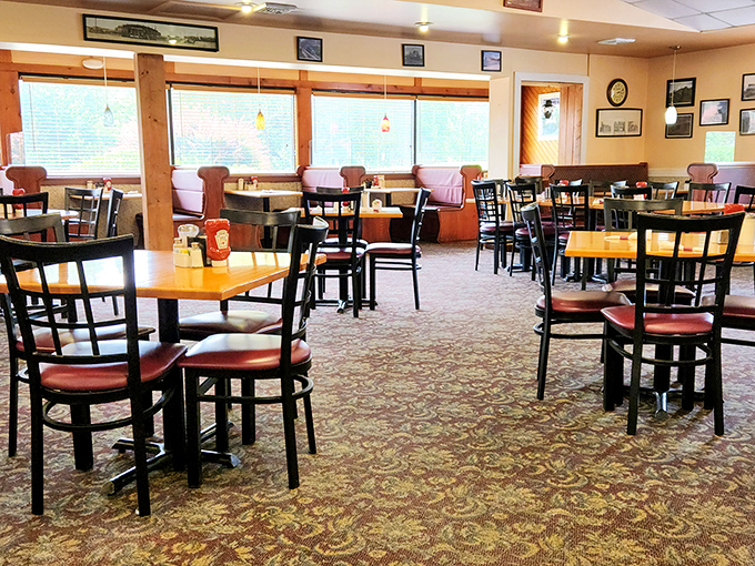 Warm wood tones and comfortable seating create that "just one more cup of coffee" atmosphere that turns minutes into hours.