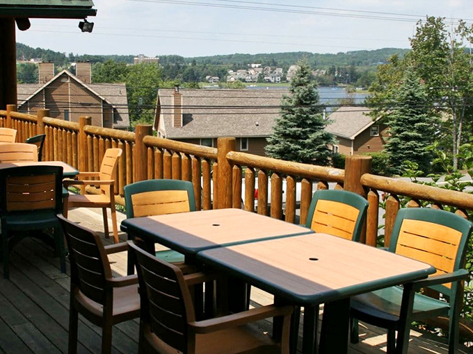 Outdoor dining with a view that feeds the soul. Those Deep Creek Lake glimpses between the trees make every bite taste better.