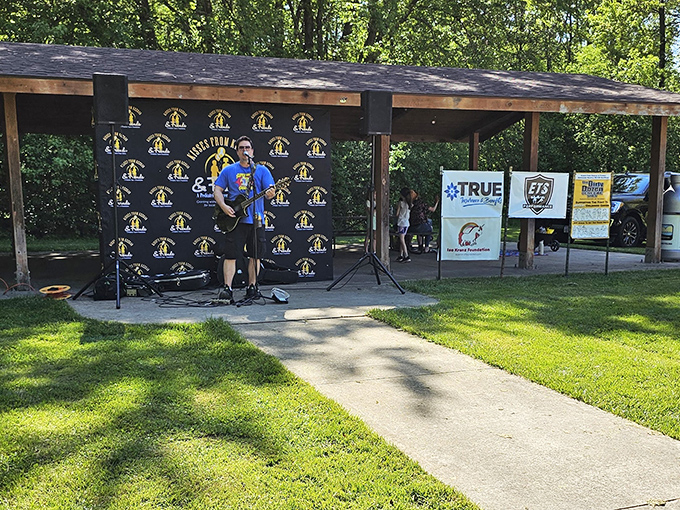 Music in the woods: Where acoustic guitars and birdsong create nature's perfect playlist under a canopy of Wisconsin green.