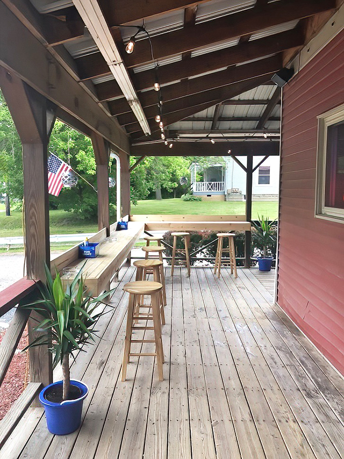 The covered porch offers al fresco dining with a side of Americana&mdash;where summer evenings stretch out like the perfect country song.