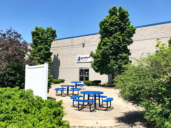 After intense bin-diving, these cheerful blue picnic tables offer a moment of respite and a place to inspect your newfound treasures.