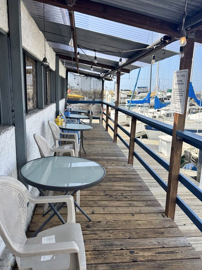 The outdoor deck offers marina views and sea breezes that enhance every bite&mdash;nature's seasoning for an already perfect meal.