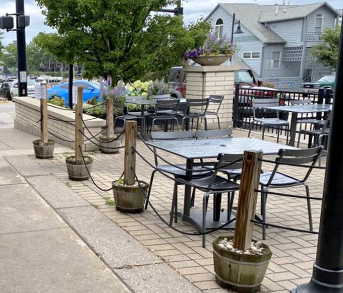 Outdoor seating that captures South Haven's lakeside charm—the perfect spot to savor small plates while watching the world drift by.