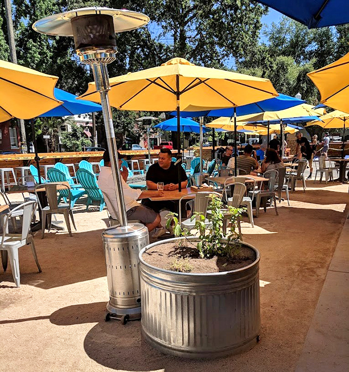 Outdoor seating under cheerful umbrellas offers a California dining experience. Sunshine is the secret ingredient they don't list on the menu.