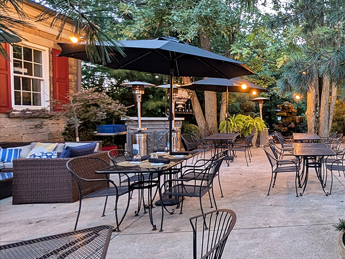 The outdoor patio offers a serene retreat&mdash;where summer evenings, good wine, and the absence of cooking responsibilities create perfect harmony.