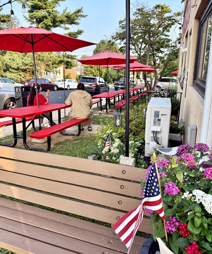 The outdoor seating area—where red umbrellas and picnic tables invite you to enjoy your feast al fresco. Pennsylvania dining at its most authentic.