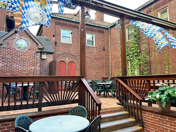The outdoor patio offers a heavenly respite from Pittsburgh's bustle, with brick walls and blue-and-white Bavarian flags overhead.