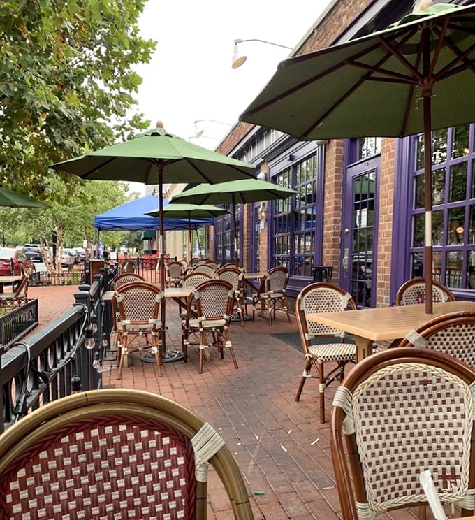 The brick patio offers al fresco dining under green umbrellas, where Alexandria's charm provides the perfect appetizer to any meal.