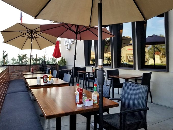 The outdoor patio offers al fresco dining under cheerful umbrellas, where California sunshine becomes the perfect additional ingredient to every meal.
