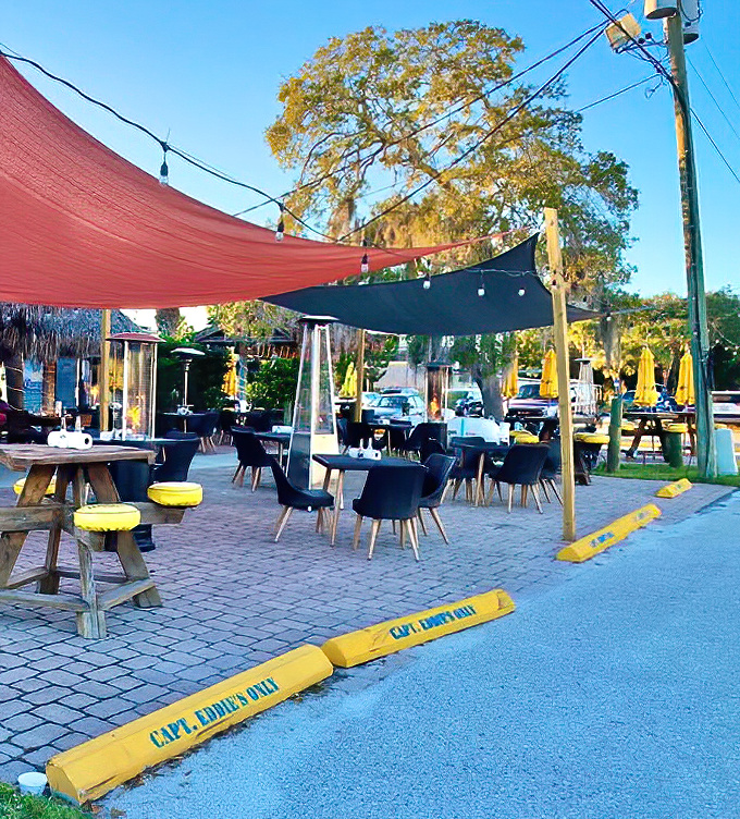 Outdoor seating under colorful canopies &ndash; because vitamin D and seafood are Florida's version of wine and cheese. Pure sunshine therapy.