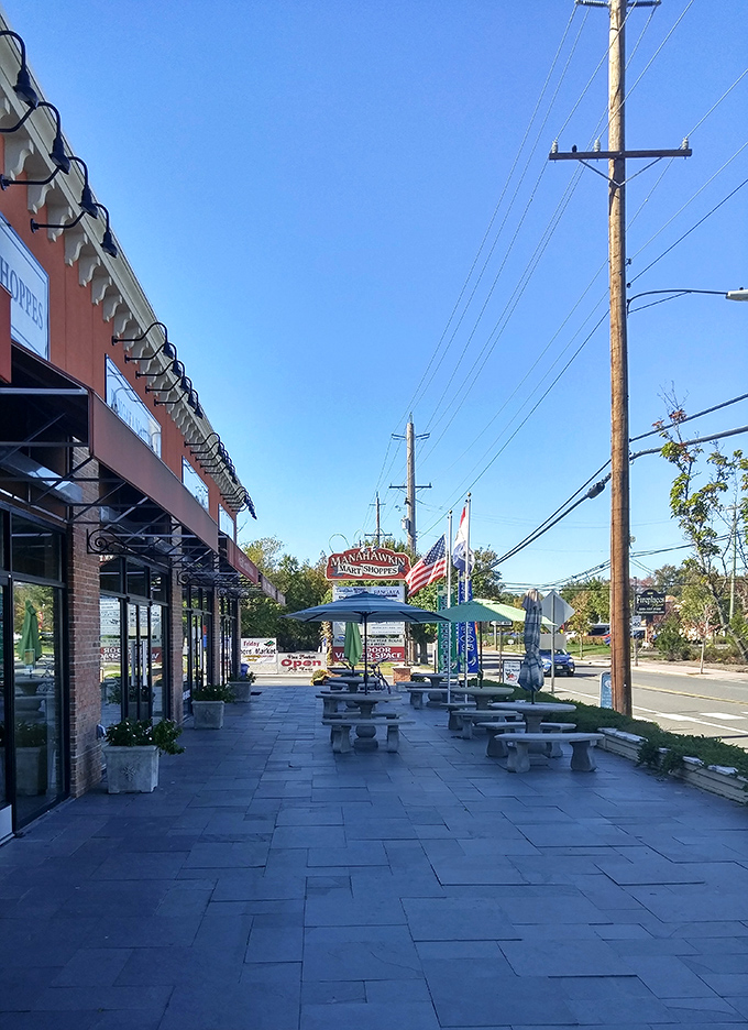 Picnic tables awaiting weary shoppers&mdash;the perfect pit stop to rest your feet and strategize your next bargain battlefield approach.