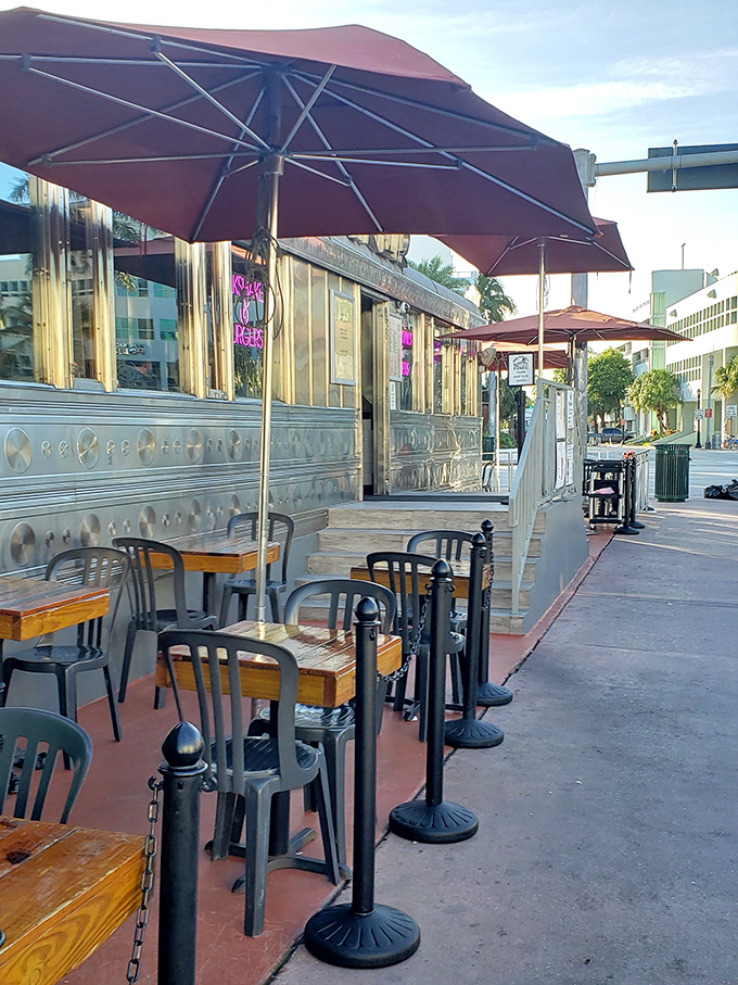 The interior view showcases the diner's authentic curved ceiling, pendant lighting, and the bustling energy of a beloved local institution.