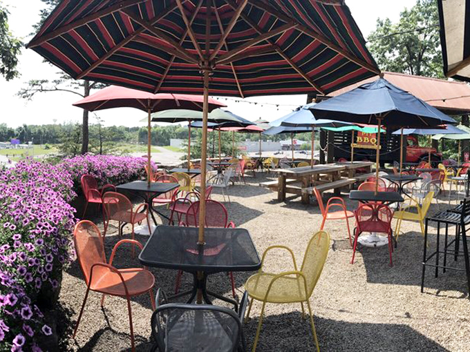 The outdoor patio &ndash; where purple flowers and colorful chairs create a cheerful oasis for enjoying ribs while watching the world float by.