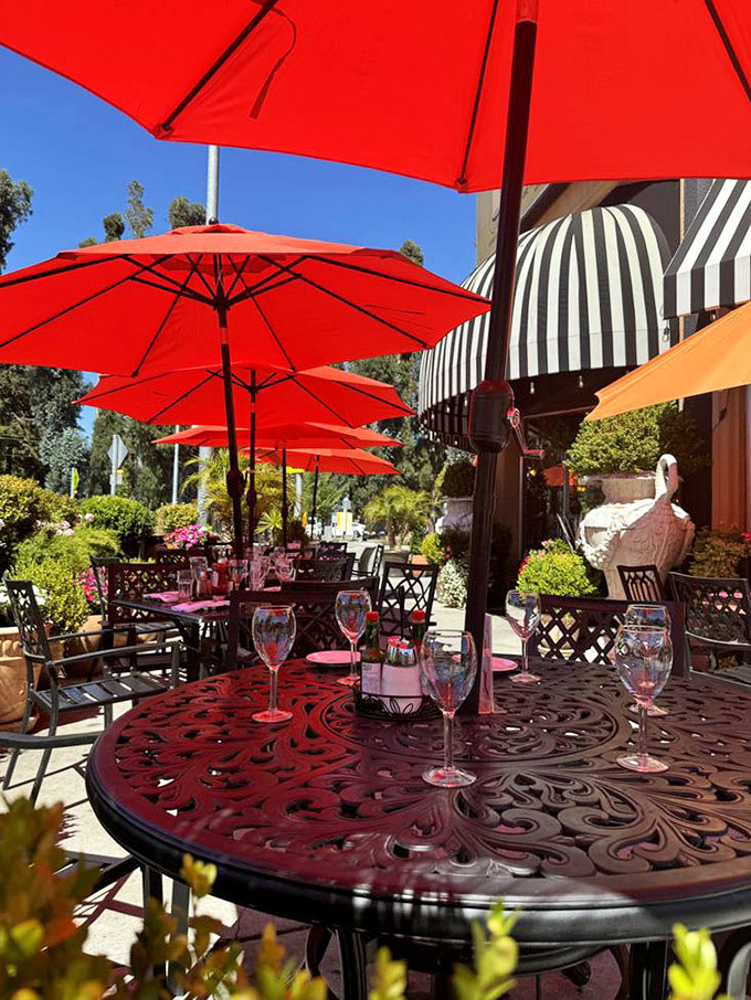 California sunshine and breakfast combine perfectly on the patio &ndash; red umbrellas providing just enough shade while you savor every bite.