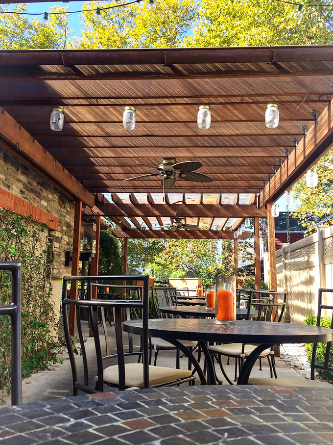 The covered patio offers al fresco dining with mason jar lights that twinkle like fireflies on a Louisiana evening.