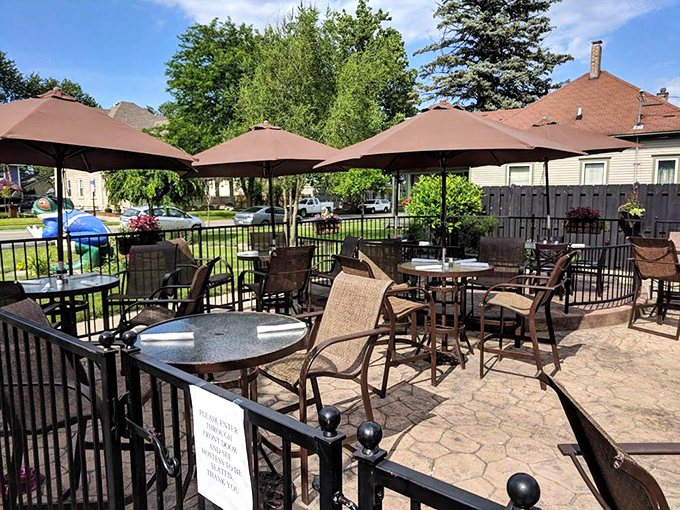 The outdoor patio&mdash;where summer evenings stretch into perfect memories. These tables have witnessed first dates, anniversaries, and countless "I can't believe how good this is" moments. 