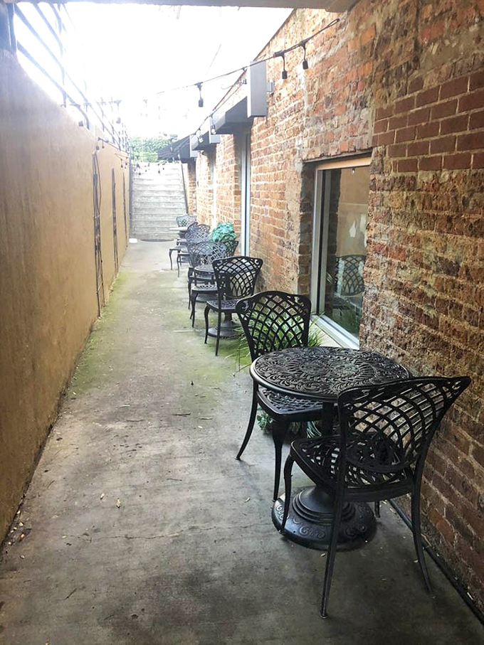 Outdoor seating for those rare perfect South Carolina days. Brick walls on one side, fresh air on the other, coffee excellence throughout.