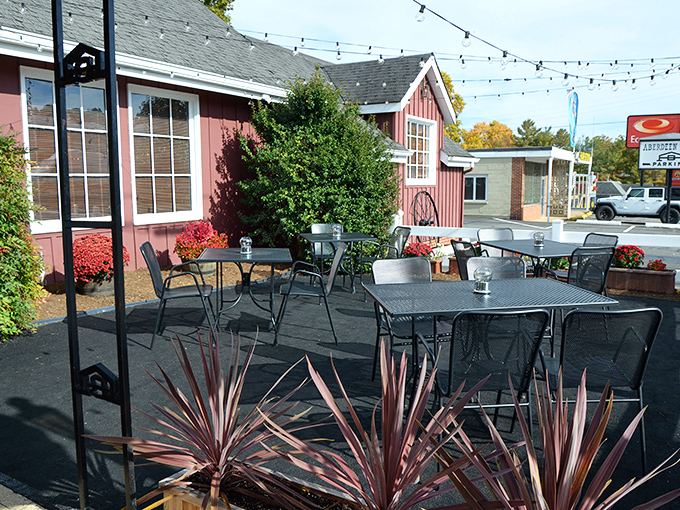 The outdoor patio offers al fresco dining with string lights overhead&mdash;proof that even classic steakhouses know how to embrace modern dining trends.