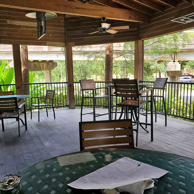 Outdoor seating that brings Louisiana's lush greenery right to your table &ndash; perfect for those "too pretty to eat inside" kind of days.