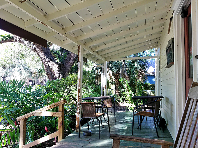 The outdoor seating area whispers, "Stay awhile," as dappled sunlight filters through ancient oaks &ndash; nature's perfect dining room.