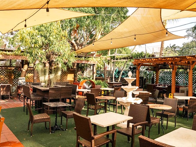 As night falls, Old's Havana glows like a lantern, beckoning hungry souls with the promise of crispy pork and cold drinks.