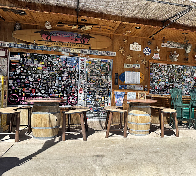 The outdoor patio where barrel tables and surfboards create the perfect "desert beach" vibe. Sticker collections that rival any teenager's laptop.